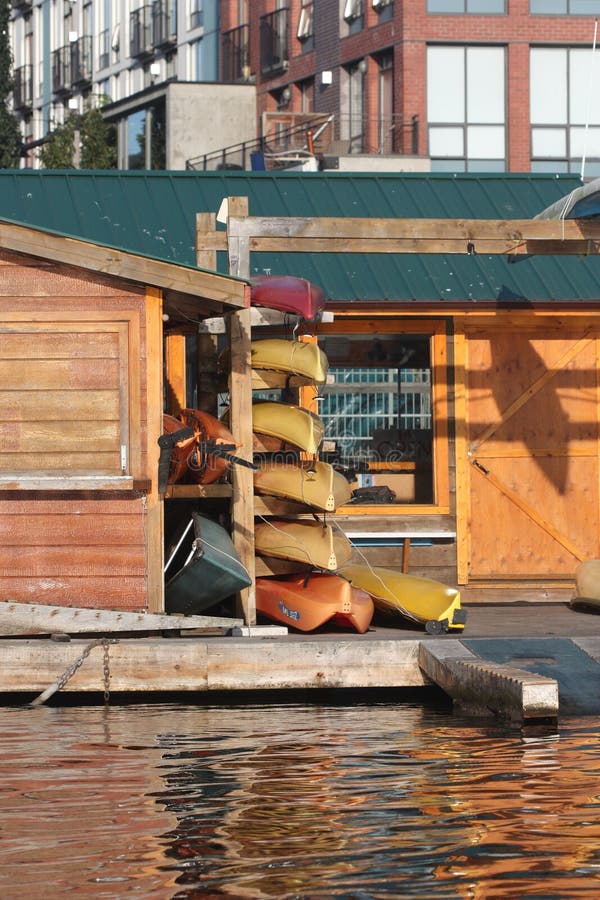 Many Kayaks Hanging on a Rack. Stock Photo - Image of pier, outside ...