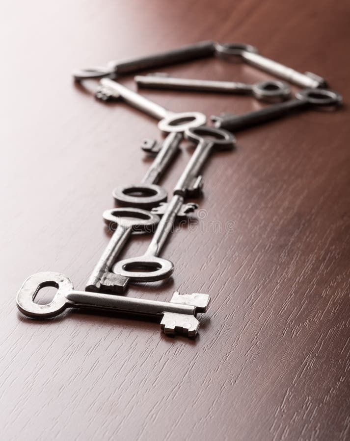 Many Keys in the Shape of a Key Stock Photo - Image of grey, design ...