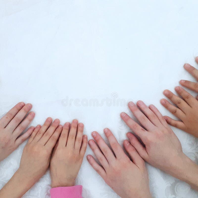 Many Kids Hands Together on the White Table, Top View Stock Image ...