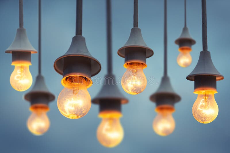 Many Light Bulbs on Street Against Blue Sky. Stock Photo - Image of ...