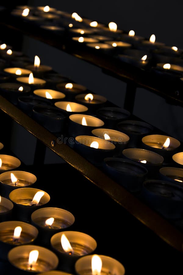 Many lighted candles stock image. Image of candles, pray - 60467569