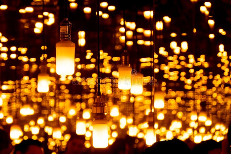 Many Lighted Candles Lit with Mirrors Reflecting the Light Throughout ...
