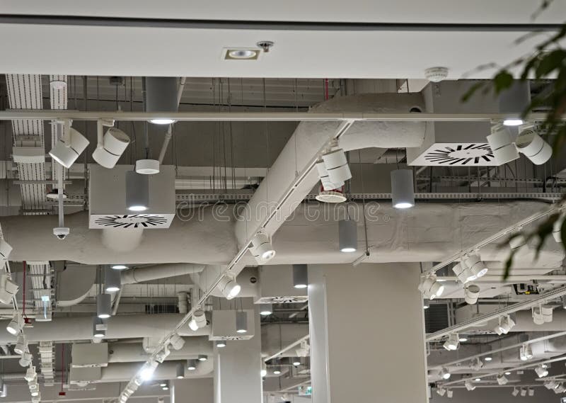 Many Lighting Lamps on the Ceiling of a Supermarket Stock Photo - Image ...