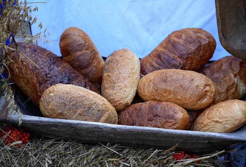 Stacked Loaves of Bread on Shelf in Bakery, Staple Food Stock Photo ...