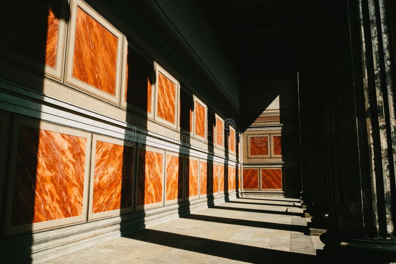 Many Marble Columns on the Floor, with Windows, Against Dark Wall Stock ...
