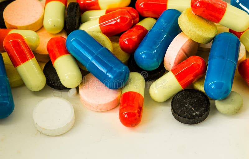 Many Medical Tablets on a White Background Stock Photo - Image of macro ...