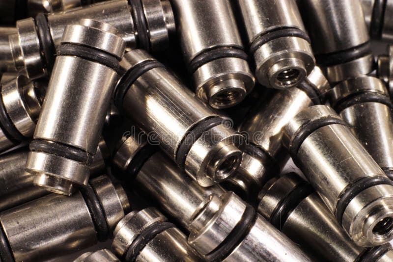 Many Metal Rods with Rubber O-rings and Threaded Holes Stock Photo ...