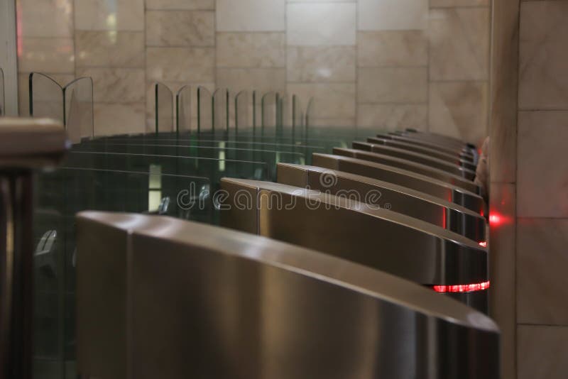 Many Metal Turnstiles with Glass Doors in a Row Stock Image - Image of ...