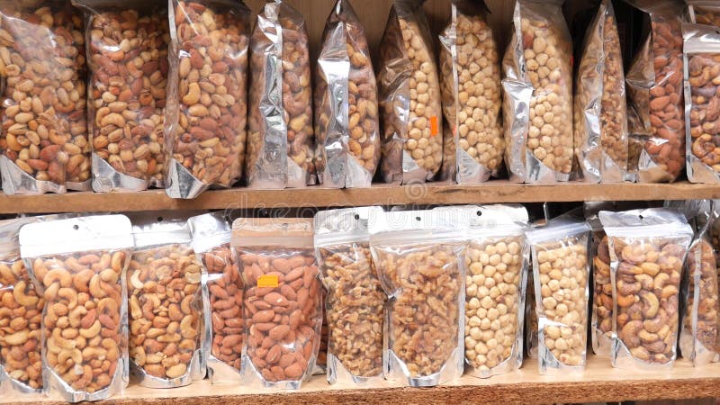 Many Mixed Nuts in a Plastic Packet on Shelf Stock Video - Video of ...