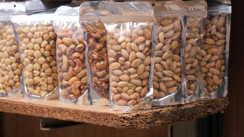 Many Mixed Nuts in a Plastic Packet on Shelf Stock Footage - Video of ...