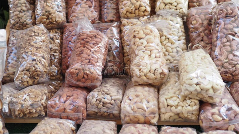 Many Mixed Nuts in a Plastic Packet on Shelf Stock Footage - Video of ...