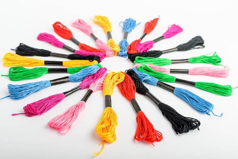 Many Mixed Vivid Colored Sewing Threads for Embroidery Displayed in a ...