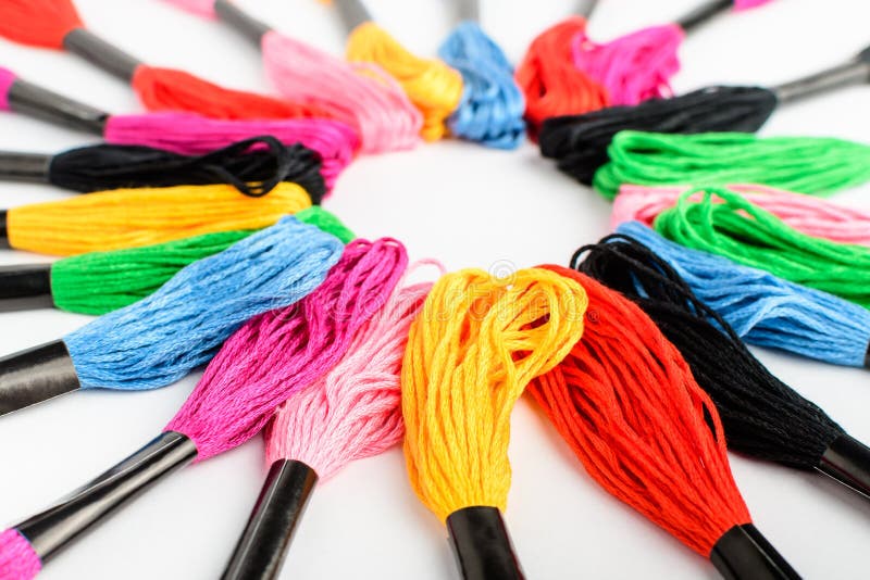Many Mixed Vivid Colored Sewing Threads for Embroidery Displayed in a ...