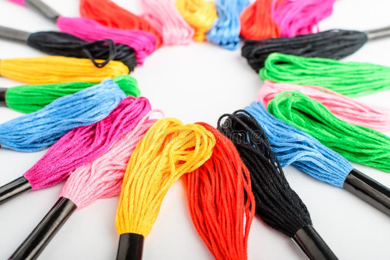 Many Mixed Vivid Colored Sewing Threads for Embroidery Displayed in a ...