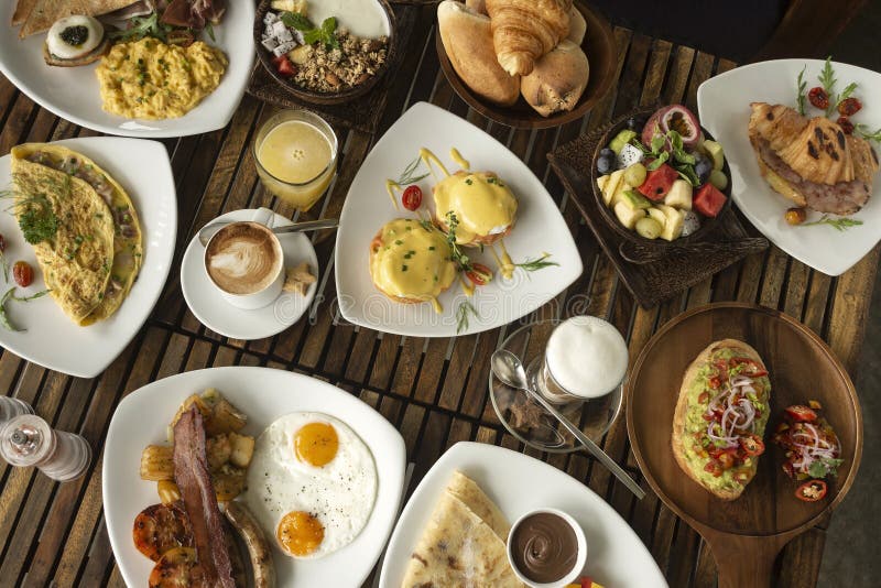 Many Mixed Western Breakfast Food Items on Cafe Table Stock Photo ...
