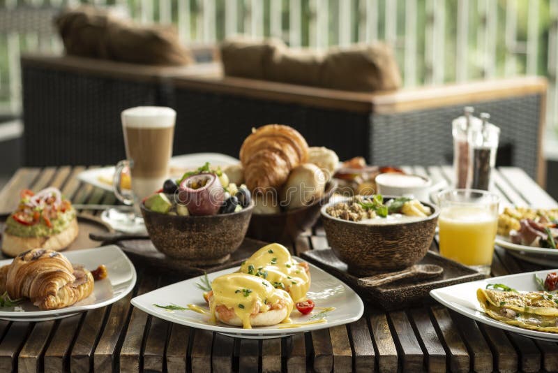 Many Mixed Western Breakfast Food Items on Cafe Table Stock Photo ...