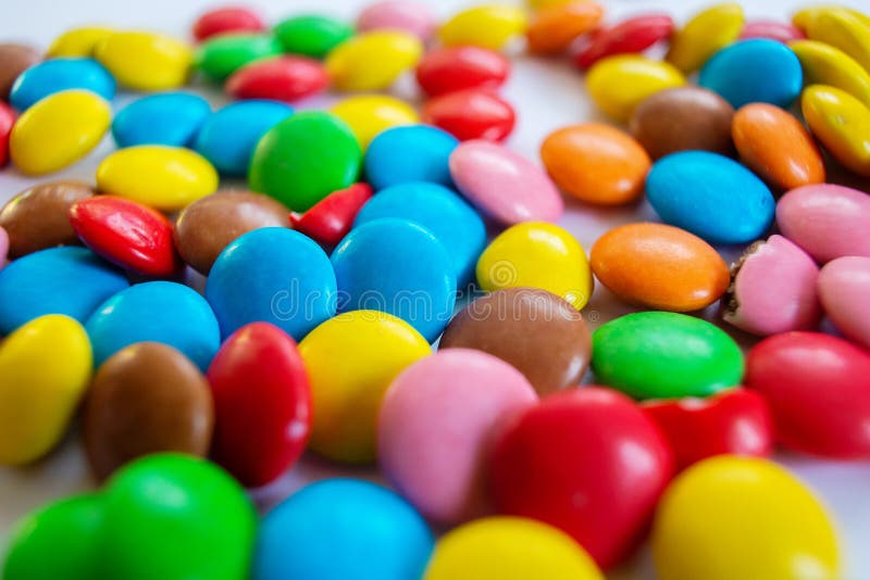 Many Multi-colored Small Round Sweets are Scattered on the Table Stock ...