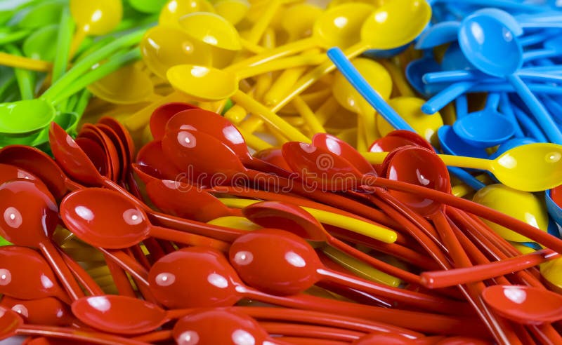 Many New Colored Plastic Spoons Stock Photo - Image of setting, white ...