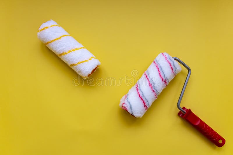 Paint Roller for Painting and Priming New on Yellow Background Stock ...