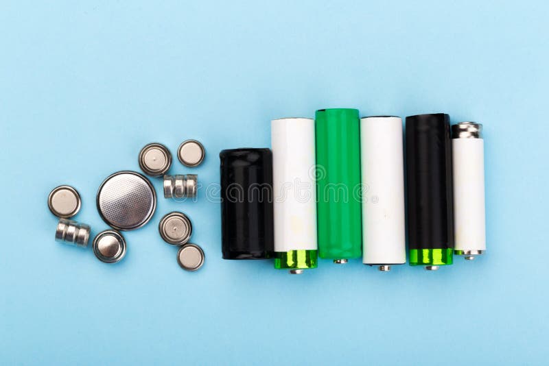 Many New and Used Batteries of Different Shapes, AA, Round Batteries on ...