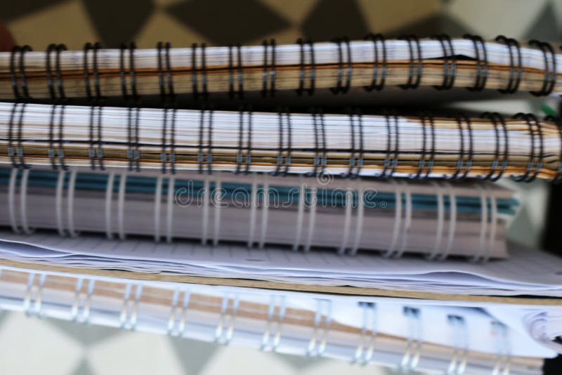 Many Notebooks of a Young Student Stock Photo - Image of listen, green ...