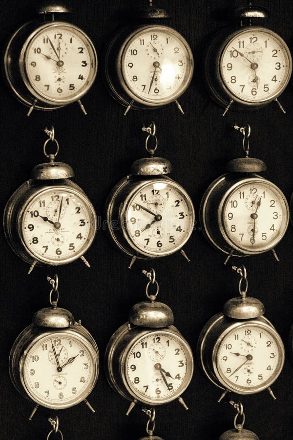 Many Old Alarm Clocks All Marking a Different Time Stock Image - Image ...