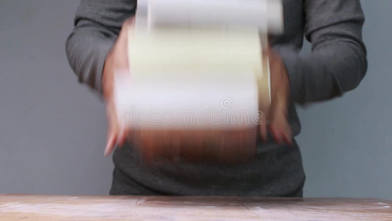 Many Old Books Falling on the Table and Spread Dust Throughout the Room ...