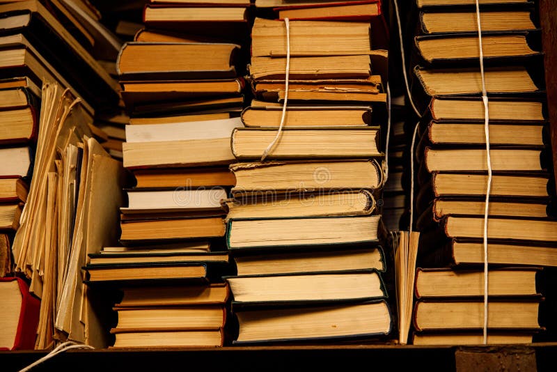 Many old books on a shelf stock image. Image of bookstore - 163479393
