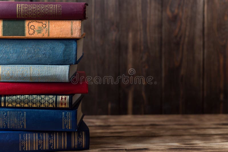 Many Old Books on Wooden Background. the Source of Information. Open ...