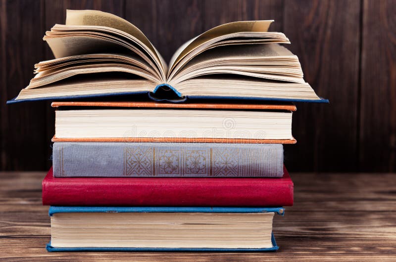 Old Books on Wooden Background. the Source of Information. Books Indoor ...