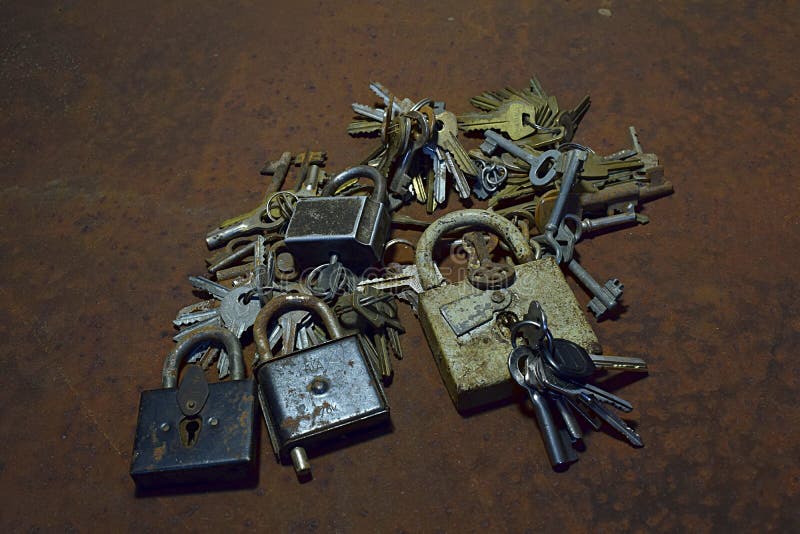 Many Old Keys and Locks on a Rusty Sheet of Iron Stock Image - Image of ...