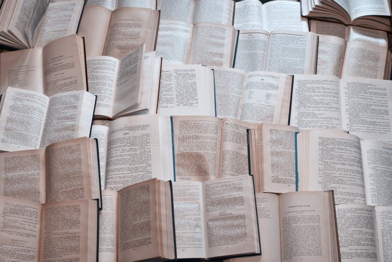 A Stack of Many Old Books on the Table-background of Bookshelve Stock ...