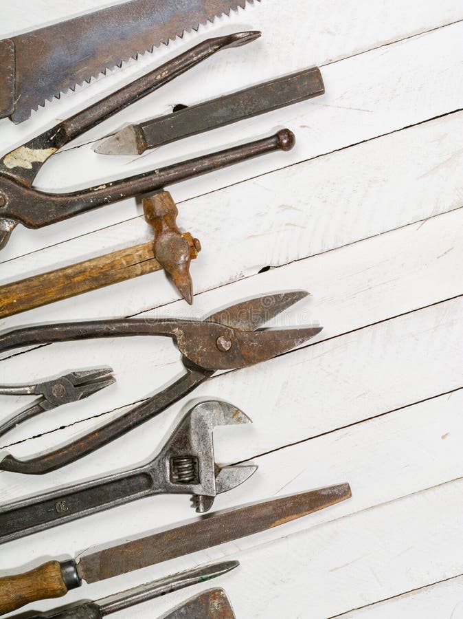 Many Old Rusty Tools Scattered on the Wooden Tstolu. View from Above ...