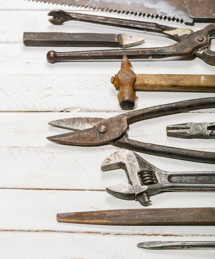 Many Old Rusty Tools Scattered on the Wooden Tstolu. View from Above ...