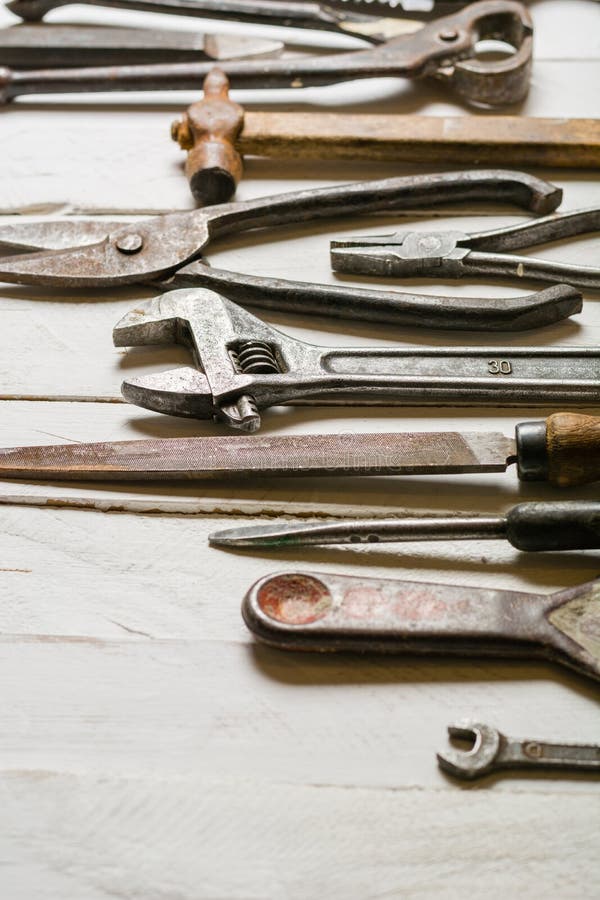 Many Old Rusty Tools Scattered on the Wooden Tstolu. View from Above ...