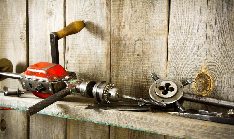 Many Old Tools ( Drill, Pliers and Others) on a Stock Image - Image of ...
