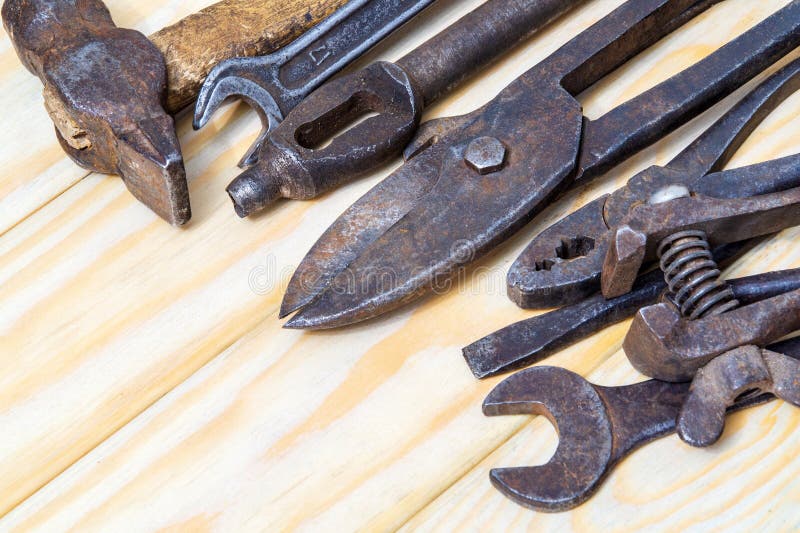 Many Old Tools Stacked after Work on Wooden Boards Stock Image - Image ...