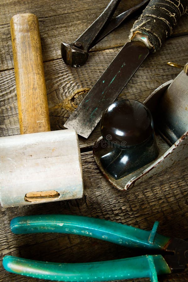 Many Old Working Tools on a Wooden Background Stock Photo - Image of ...