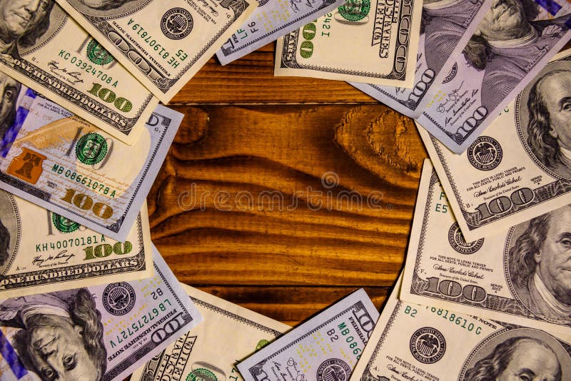 Many One Hundred Dollar Bills on Wooden Table Stock Image - Image of ...