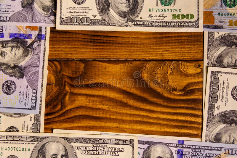 Many One Hundred Dollar Bills on Wooden Table Stock Image - Image of ...