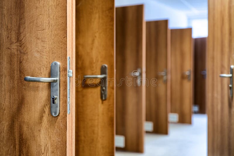Open Doors and Empty Hallway Stock Image - Image of hallway, light ...