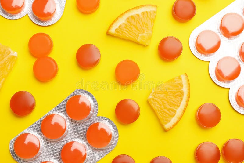 Many Orange Cough Drops on Pink Background, Flat Lay Stock Photo ...