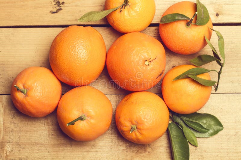 Many oranges with leaves stock photo. Image of breakfast - 104763252