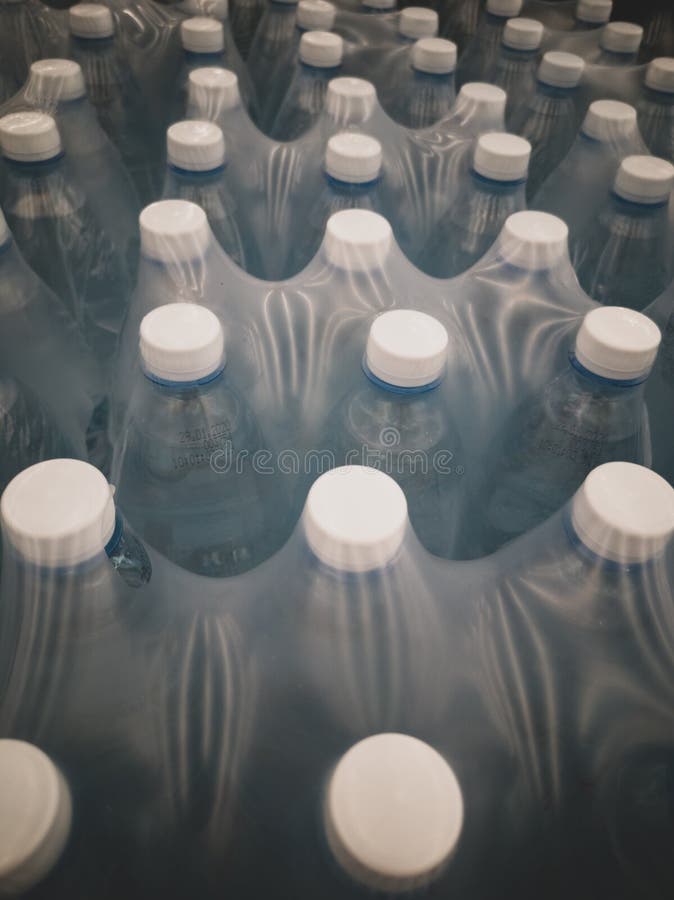 Many Packs of Mineral Bottled Water Stock Image - Image of mineral ...