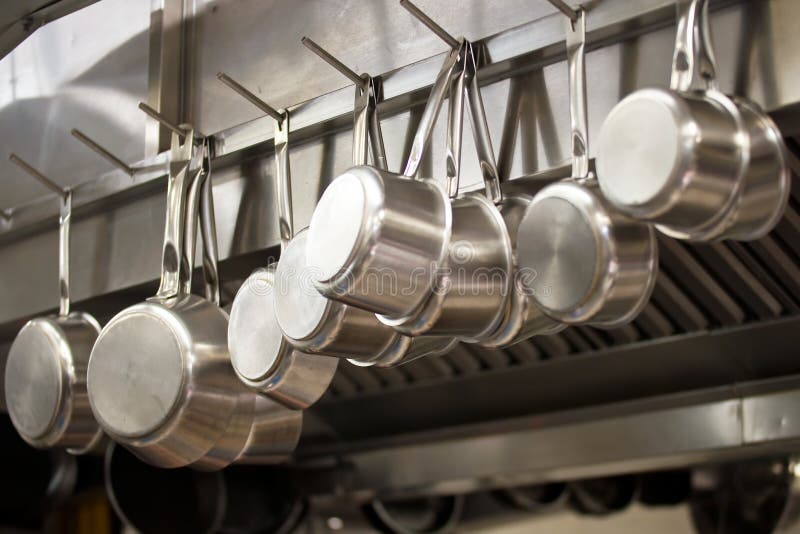 Many Pans Hanging in a Kitchen Stock Image - Image of shelf, equipment ...