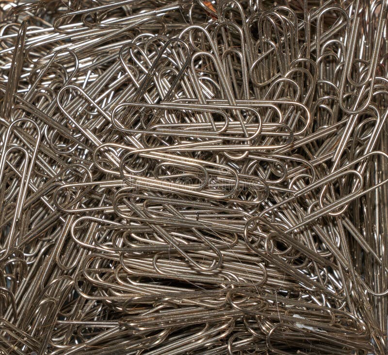 Many paperclips in pile stock photo. Image of holder - 152421276