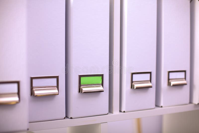 Many Papers Orderly Arranged in a File Shelves Stock Image - Image of ...