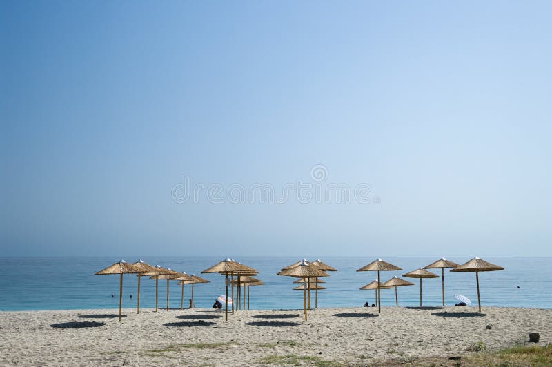 Many parasol on beach stock photo. Image of holiday, shore - 10800112