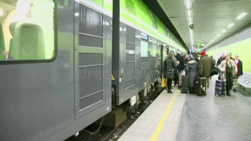 Many Passengers at Platform with Fast Green Stock Footage - Video of ...
