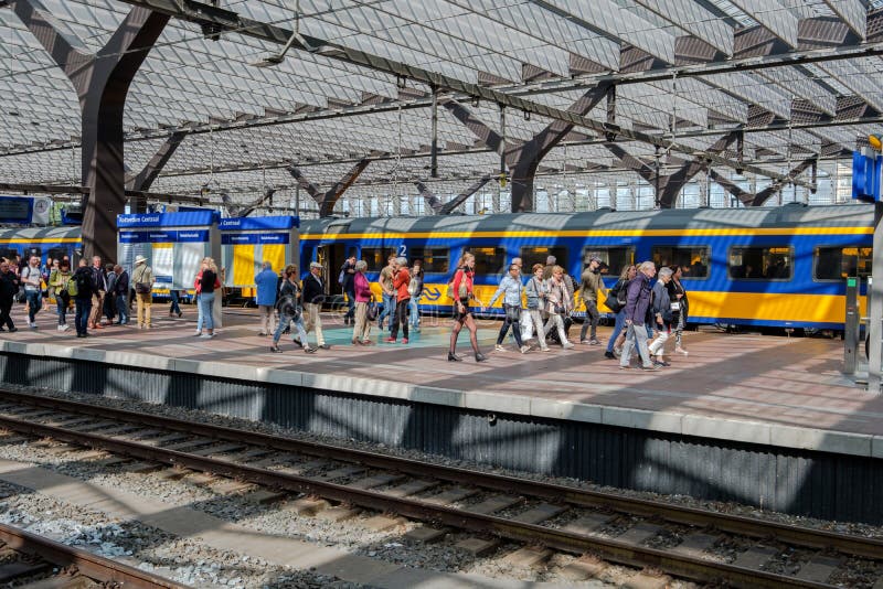 Many Passengers on a Platform Have Just Left the Train in the Ce ...